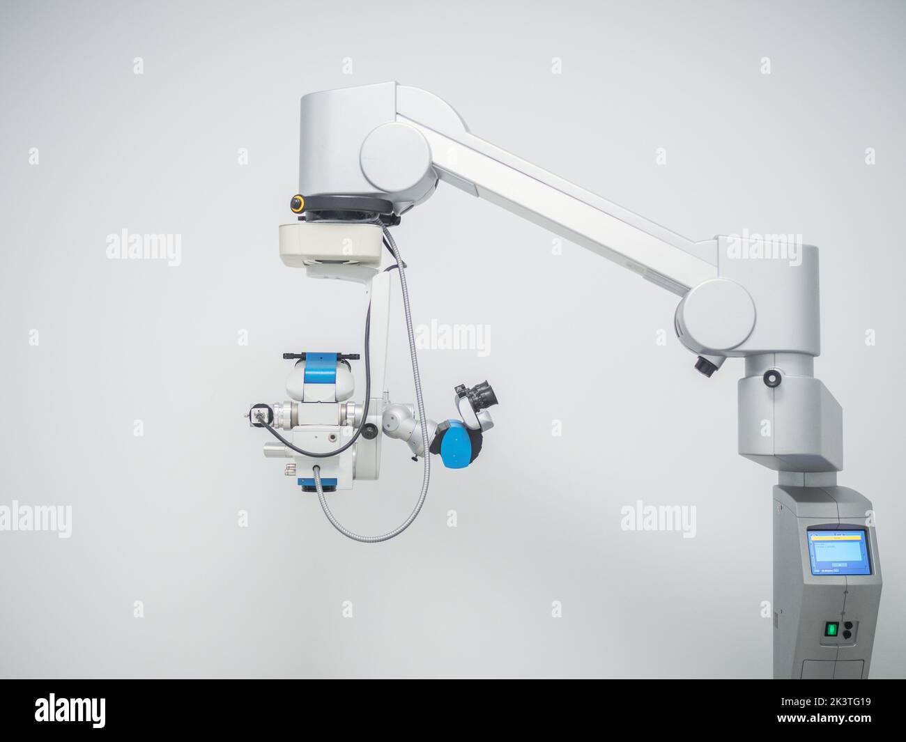 Modern microscope located over table in operating theater in modern ...