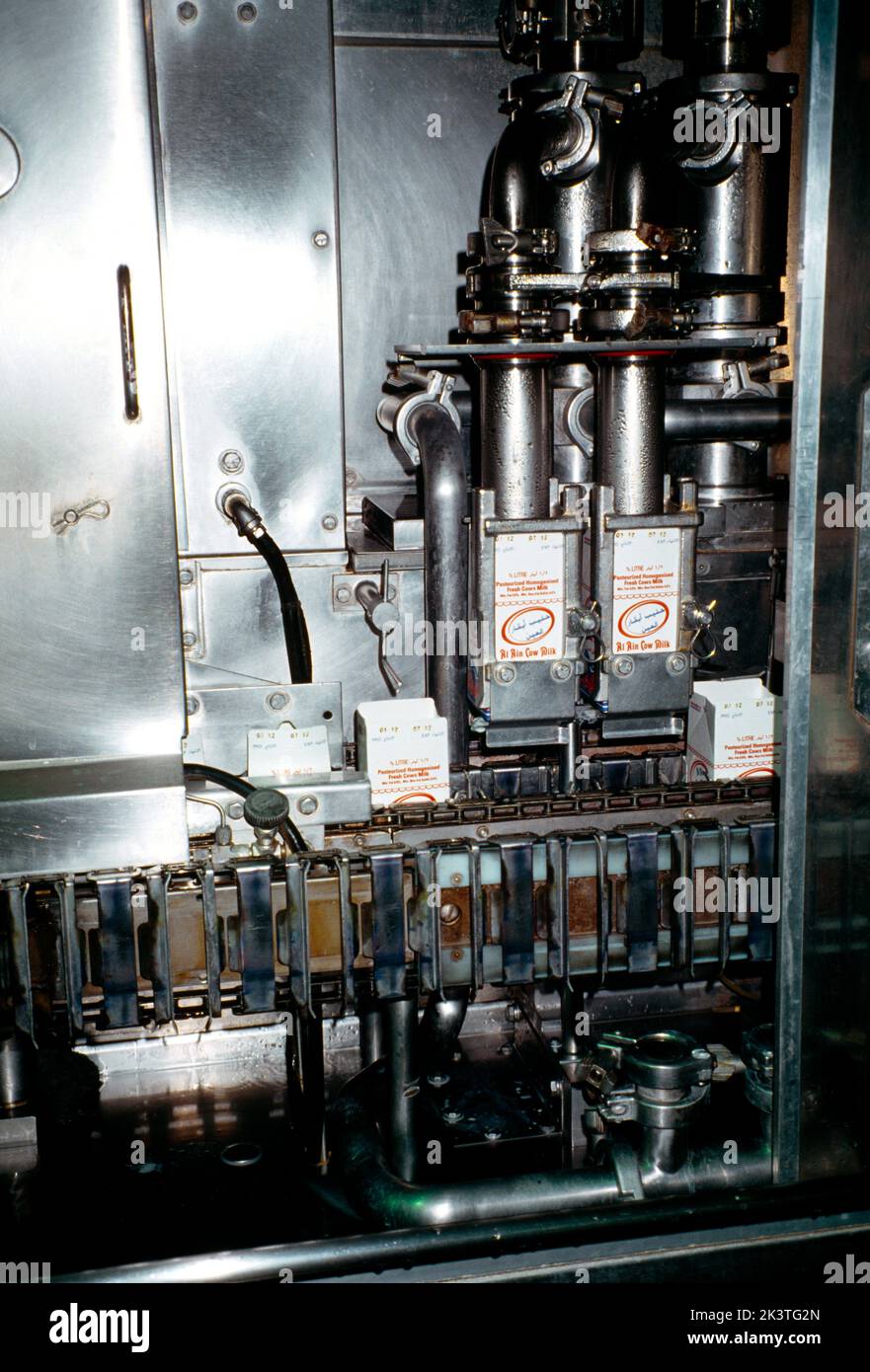 Abu Dhabi UAE Al Ain Dairy Farm Machinery Filling up Cartons with milk ...