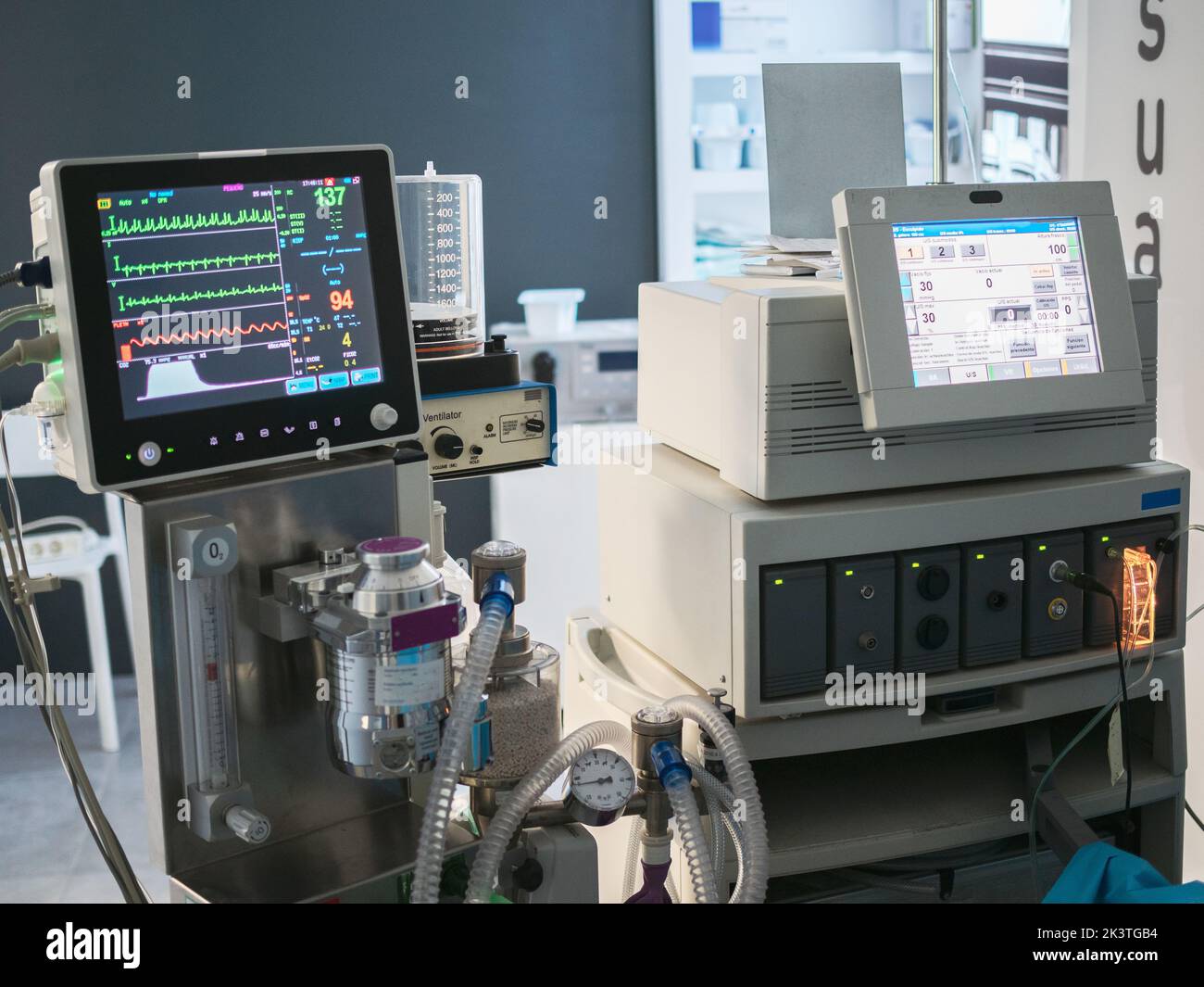 Modern equipment with vital signs monitors located in operating theater ...
