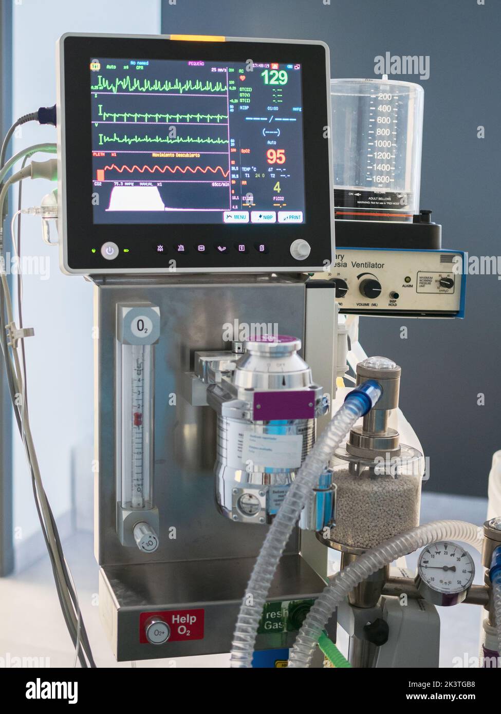 Modern equipment with vital signs monitors located in operating theater ...