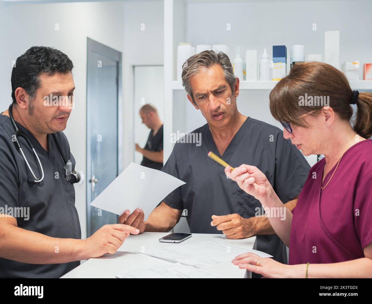Hospital employee counter hi-res stock photography and images - Alamy