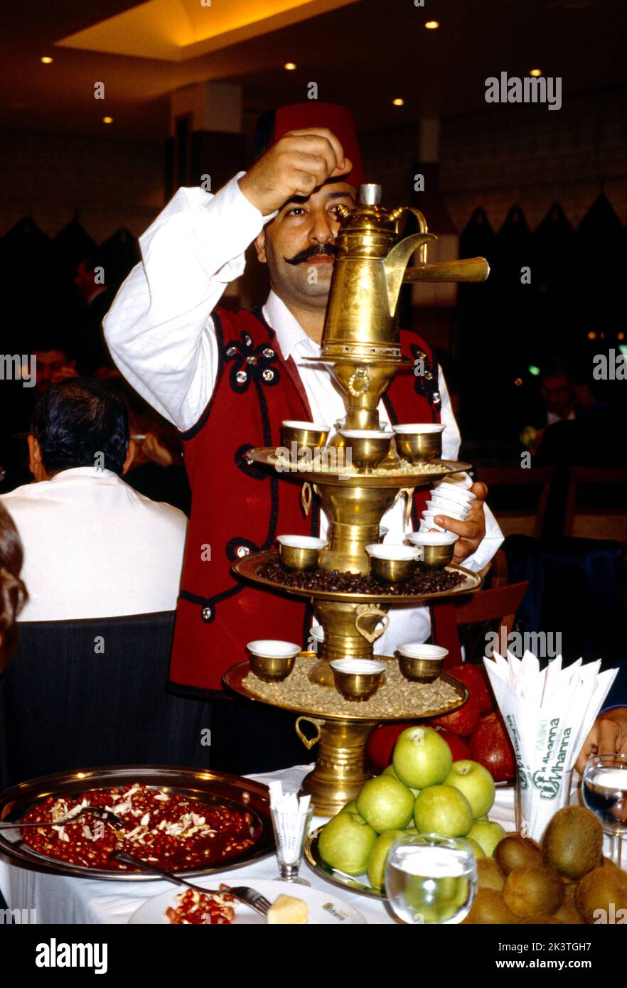 Beirut Lebanon Waiter Pouring with Arabic Coffee Pot (Dallah) And ...