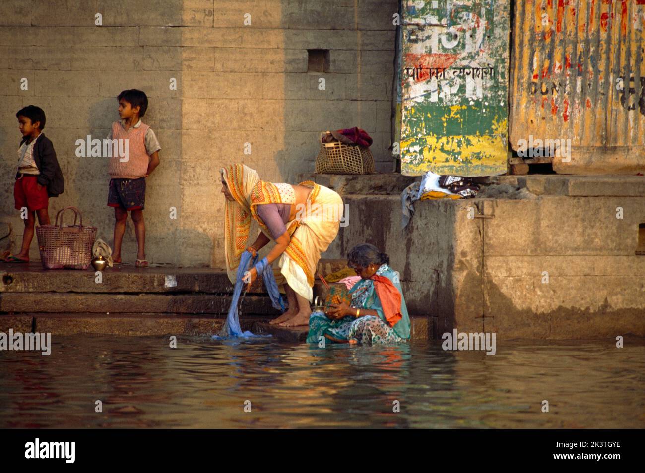 Varanasi India Women Washing Laundry and Praying in the Ganges Stock ...