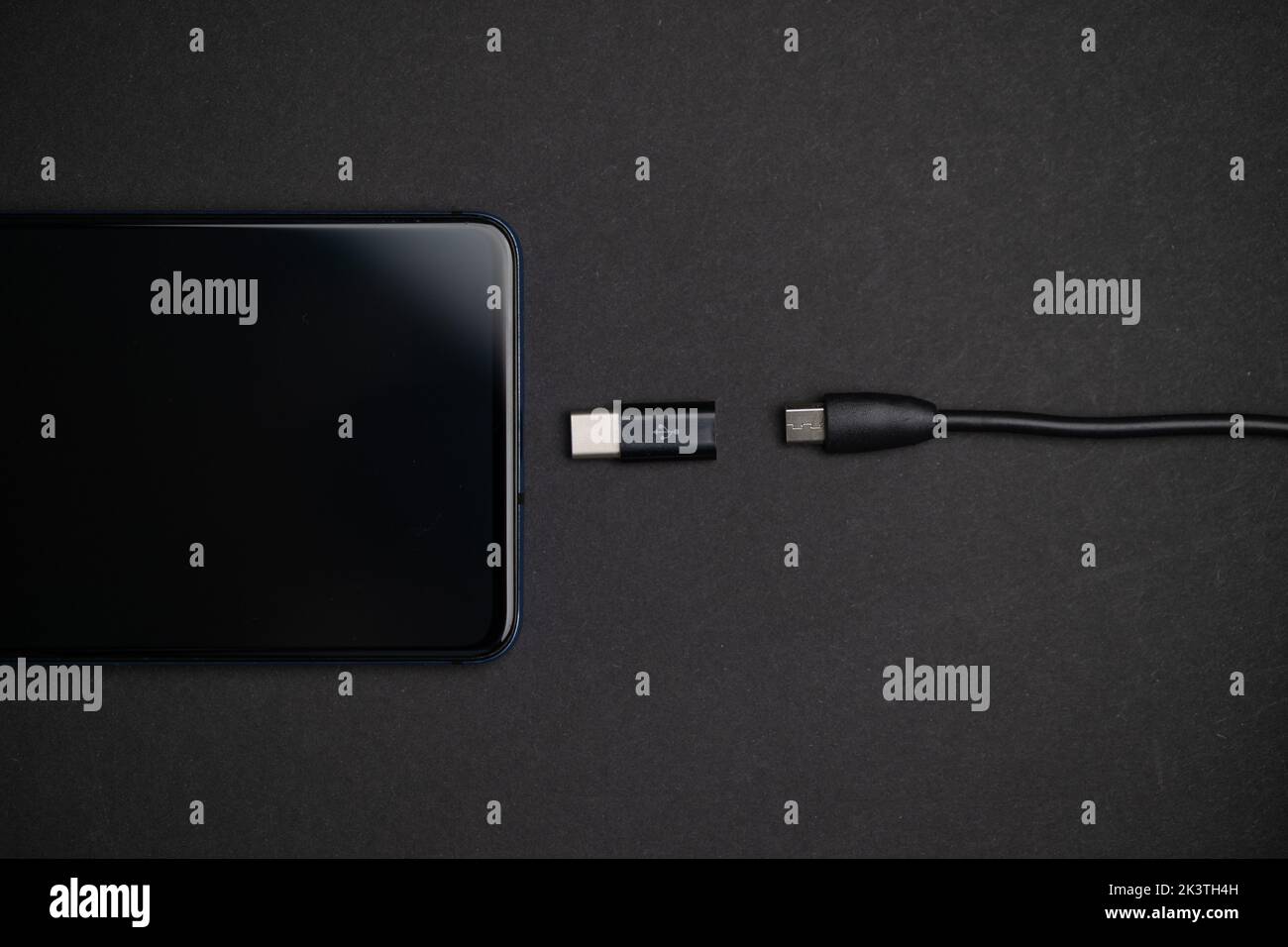 Phone with USB Type C and Micro USB to Type C adapter and cable. Top ...