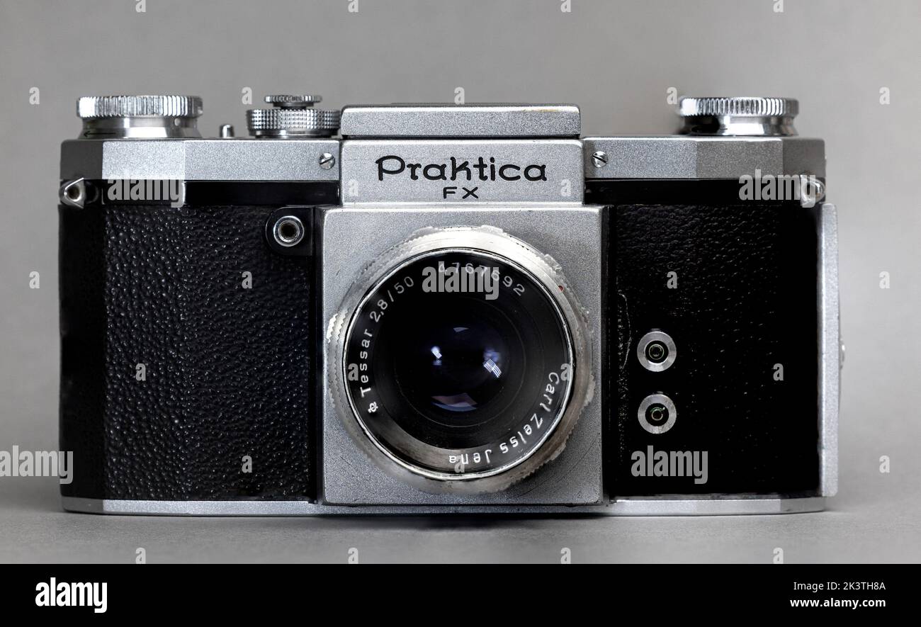 Vintage Camera on grey background. Oldschool analog camera Stock Photo ...