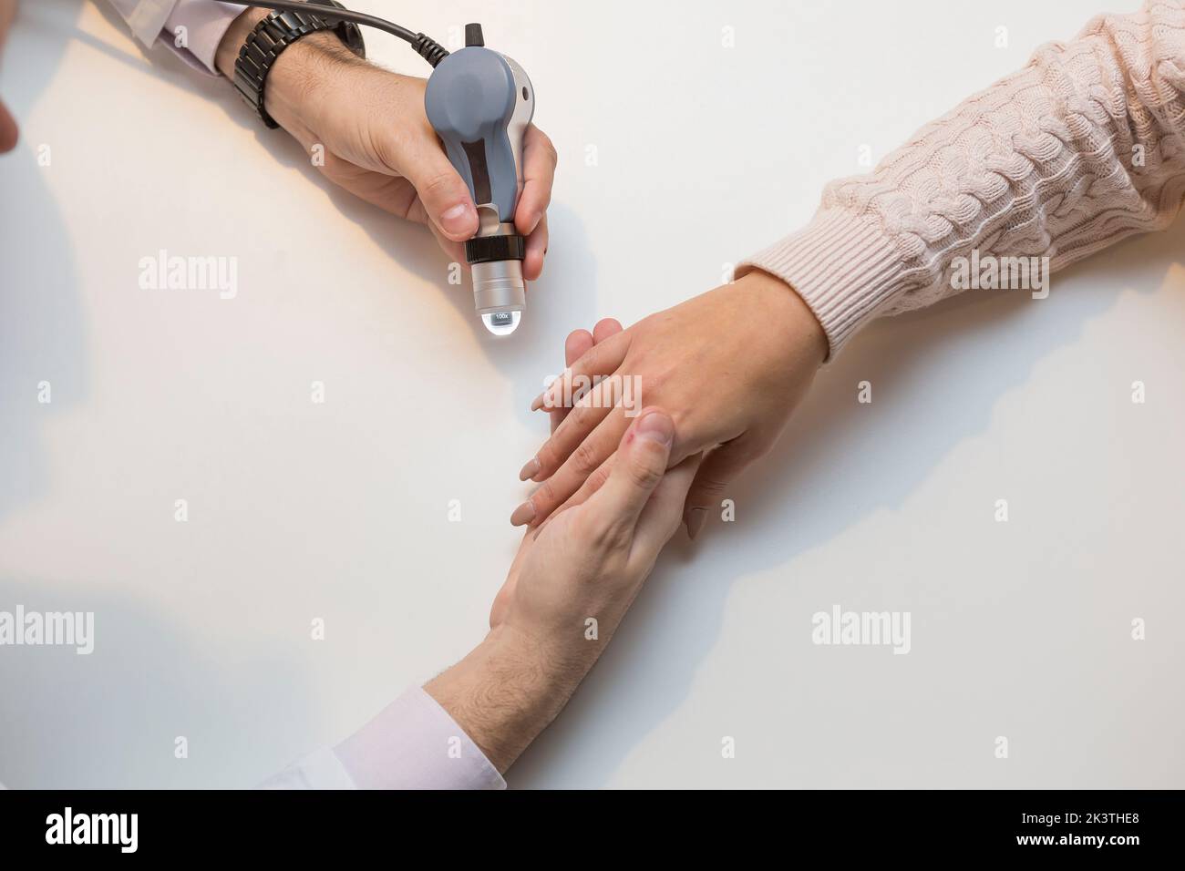 Systemic sclerosis diagnosis concept, hands of a doctor and a patient ...