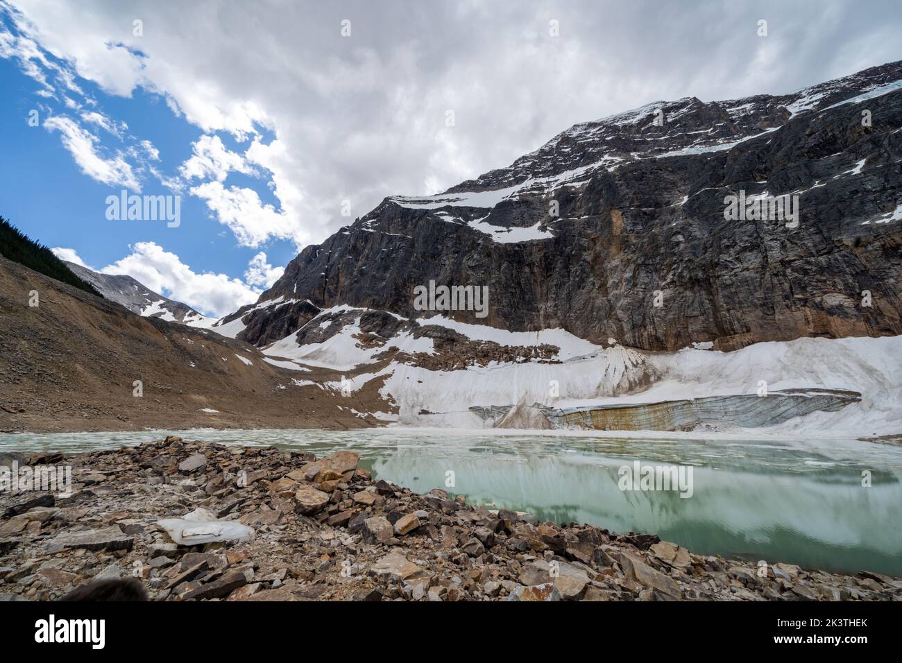 Alpine teal glacial lake at Mt. Edith Cavell in Jasper National Park ...