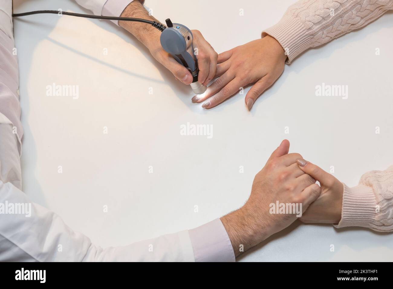 Systemic sclerosis diagnosis concept, hands of a doctor and a patient ...