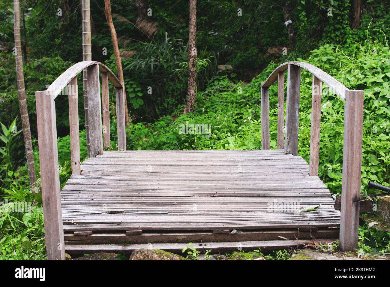 The wooden bridge almost collapsed, but it still works Stock Photo - Alamy
