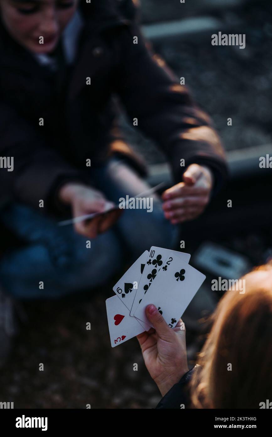 Children playing cards hi-res stock photography and images - Alamy