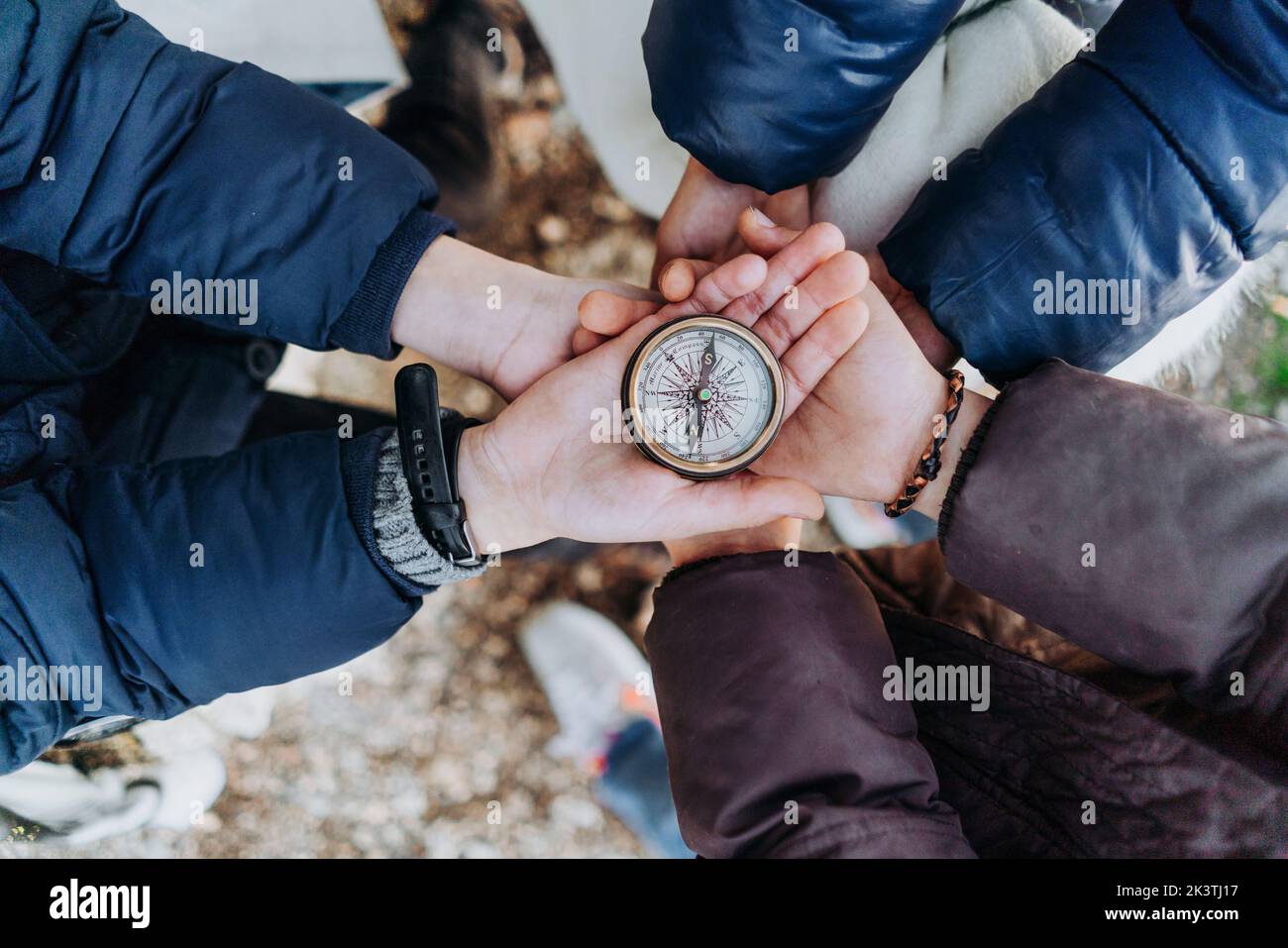 group of children holding a compass Stock Photo - Alamy
