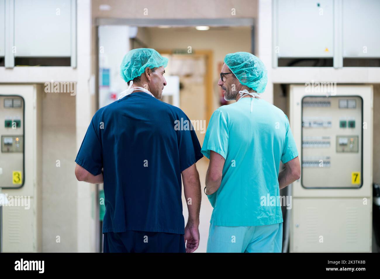Two surgeons talking in hospital Stock Photo - Alamy