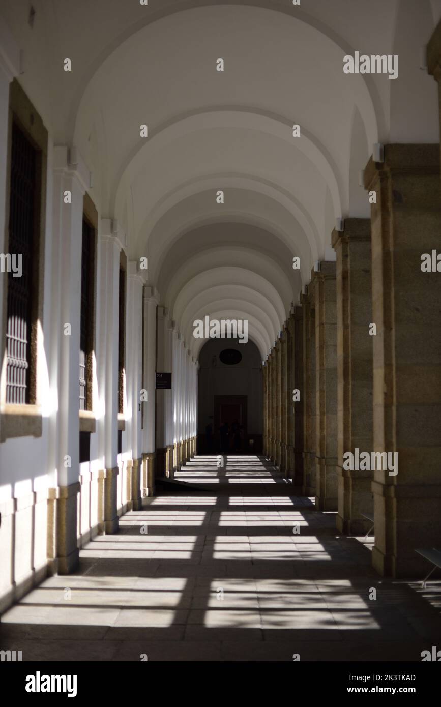 historical hallway next to outdoor court Stock Photo - Alamy