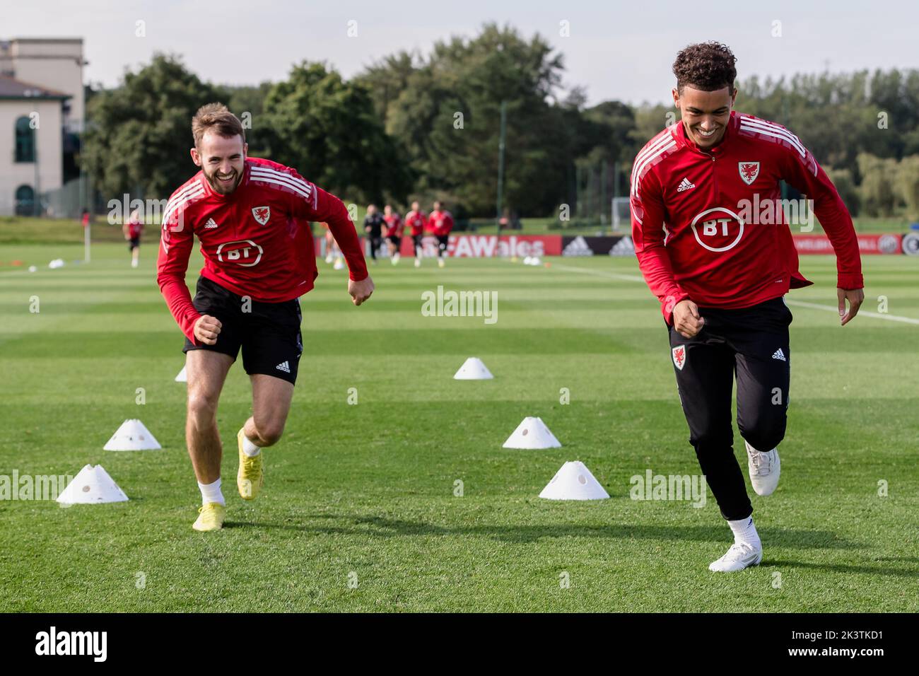 PONTYCLUN, WALES - 20 SEPTEMBER 2022: Wales' Rhys Norrington-Davies and Wales' Brennan Johnson ...