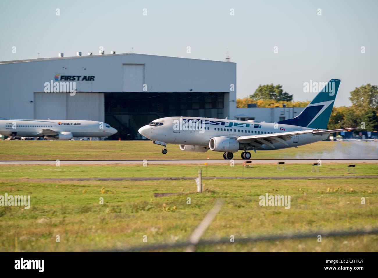 A Westjet commercial jet aircraft landing at the Ottawa McDonald ...