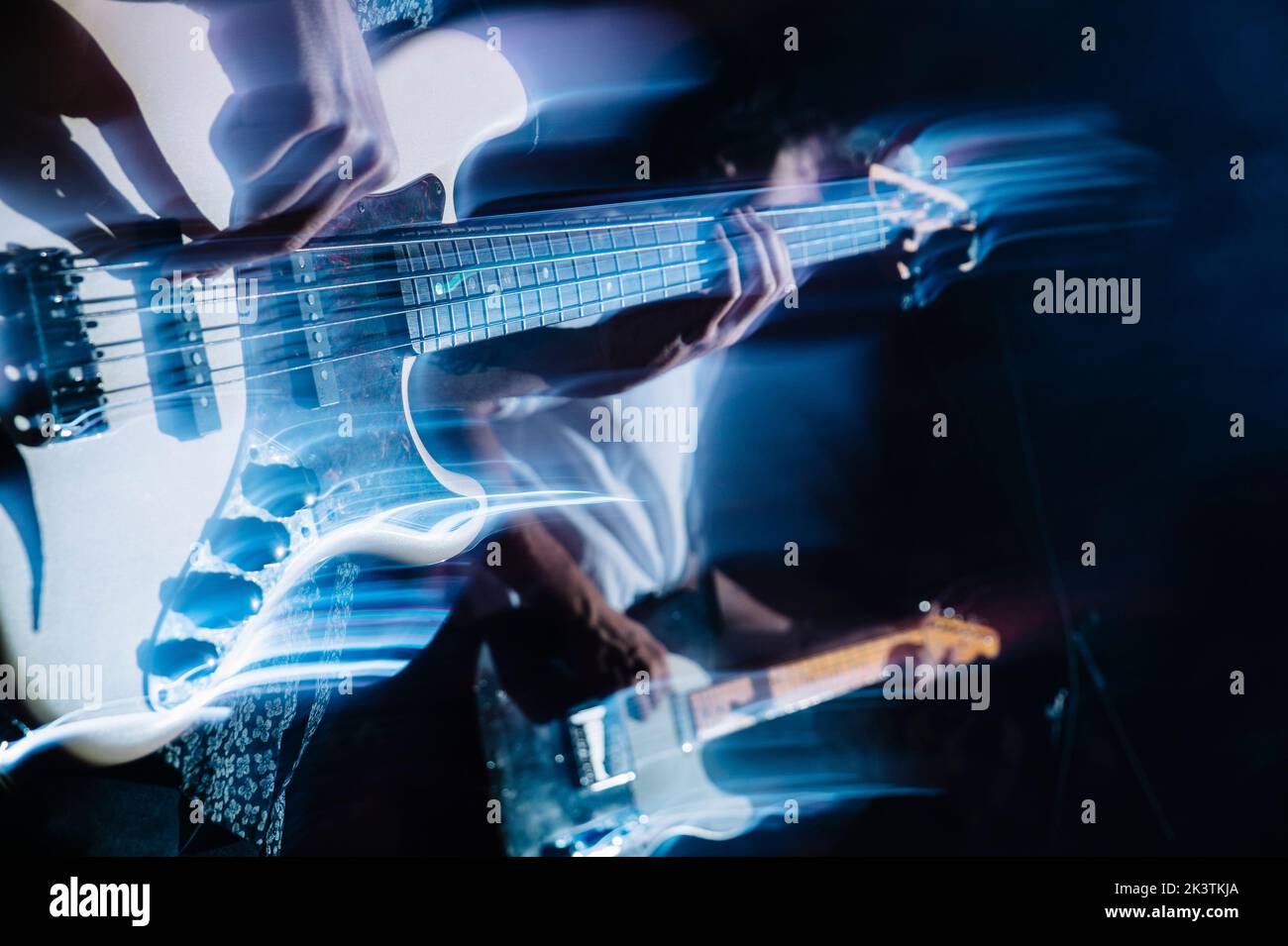 Blurred scene of musicians performing rock music on stage Stock Photo ...