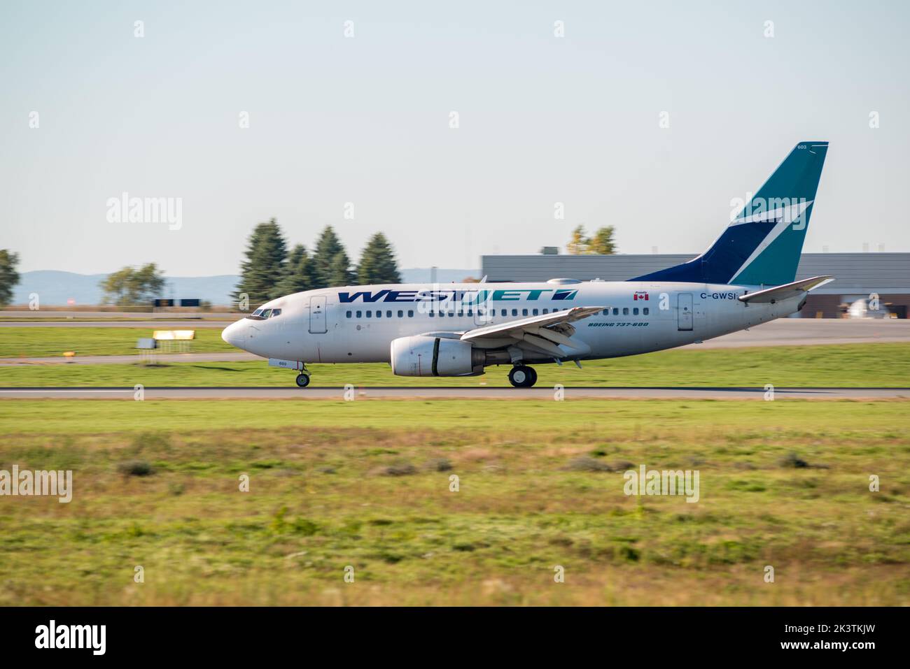 A Westjet commercial jet aircraft landing at the Ottawa McDonald ...