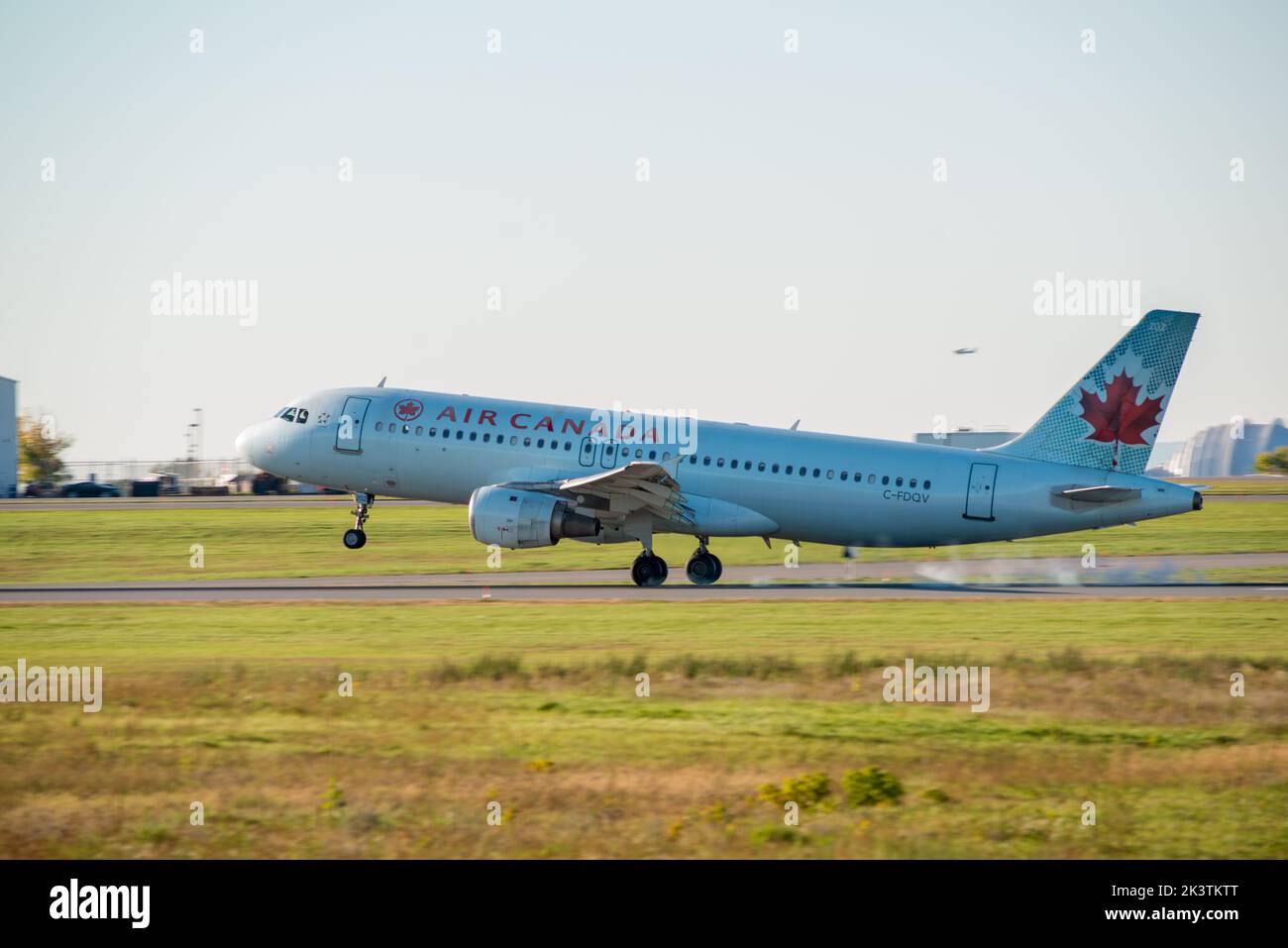 An Air Canada commercial jet aircraft landing at the Ottawa McDonald ...