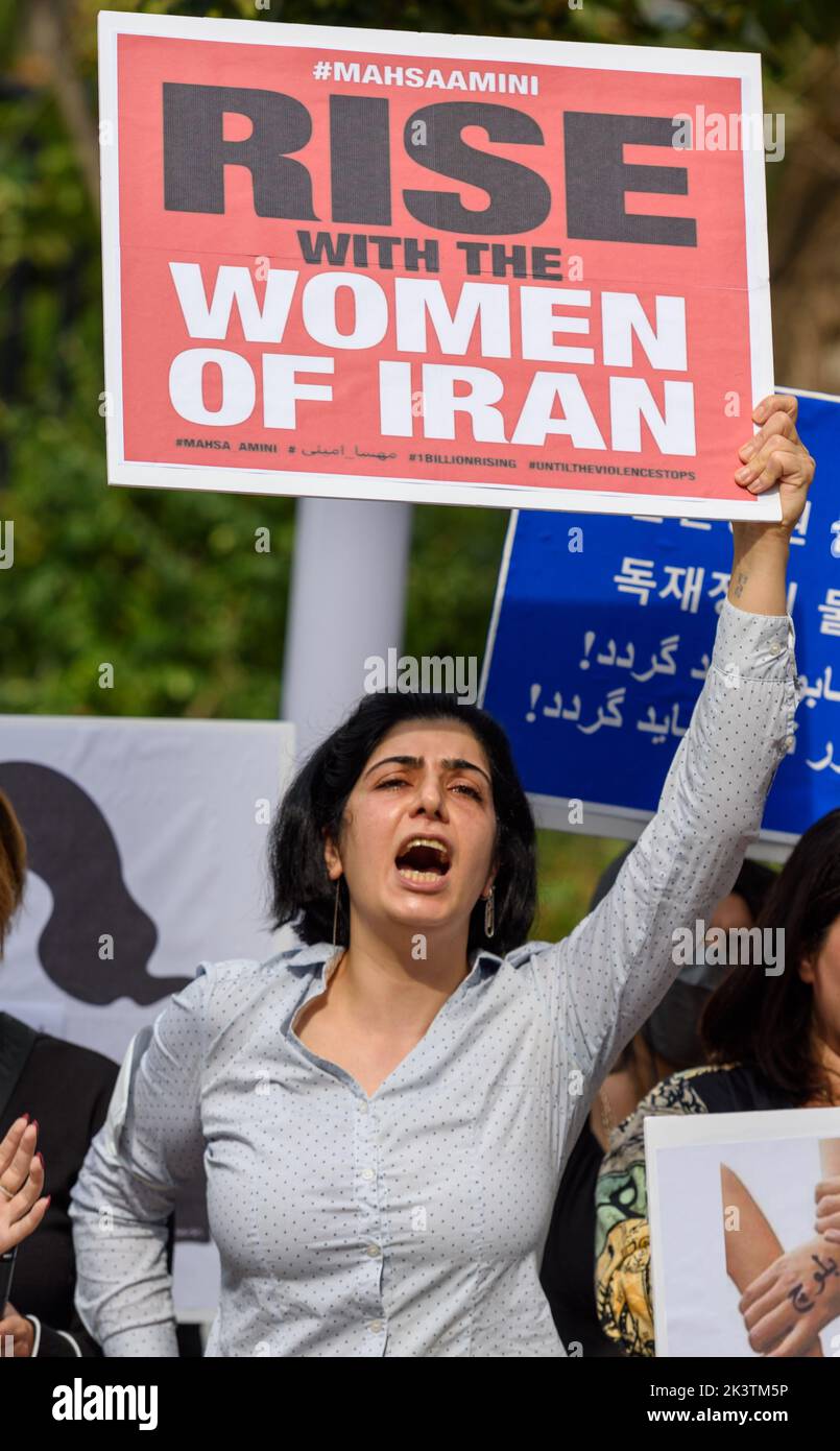 Seoul, South Korea - 28 Sept 2022, An Iranian protester holds a placard ...