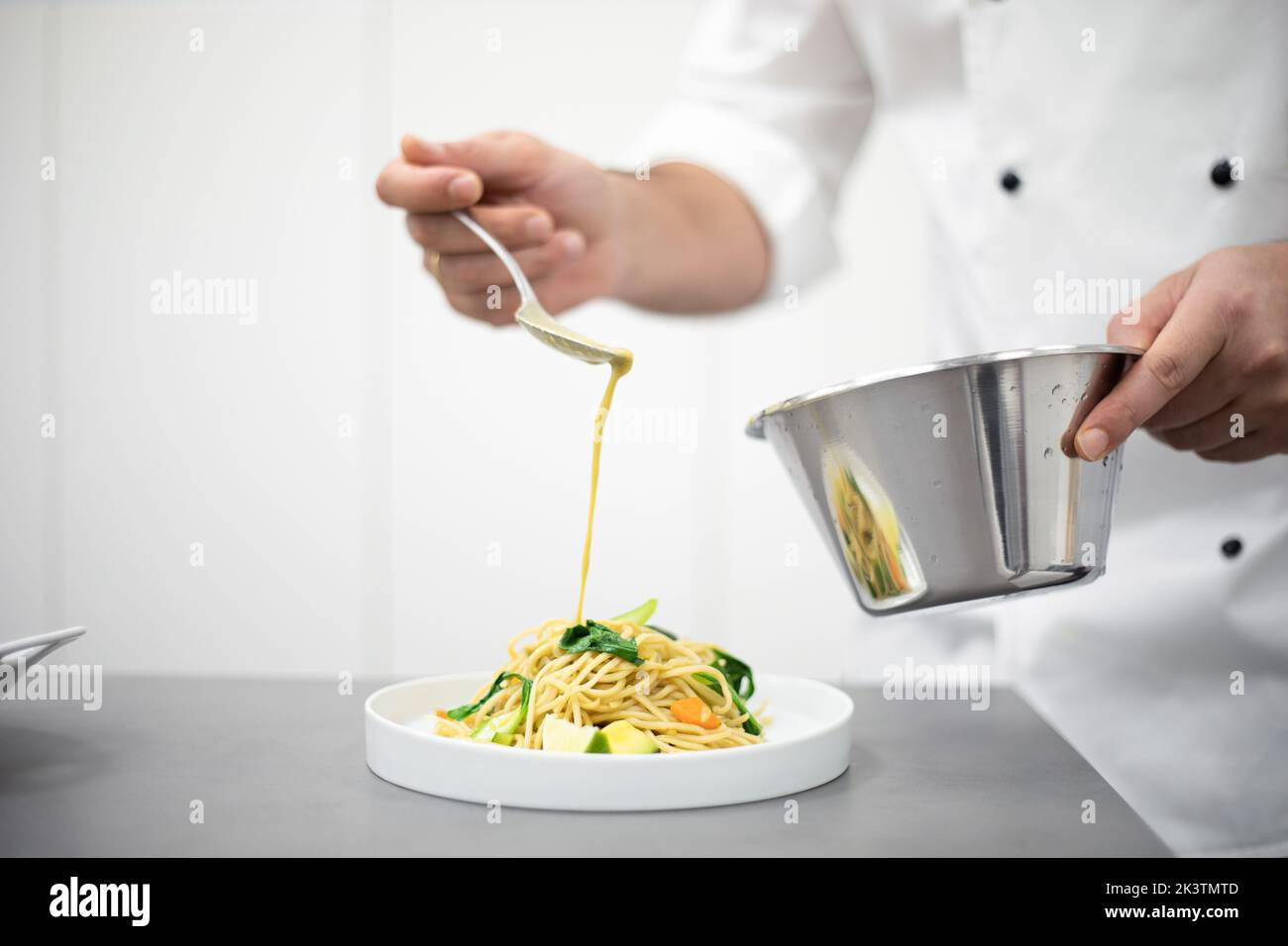Unrecognizable crop chef pouring hi-res stock photography and images ...