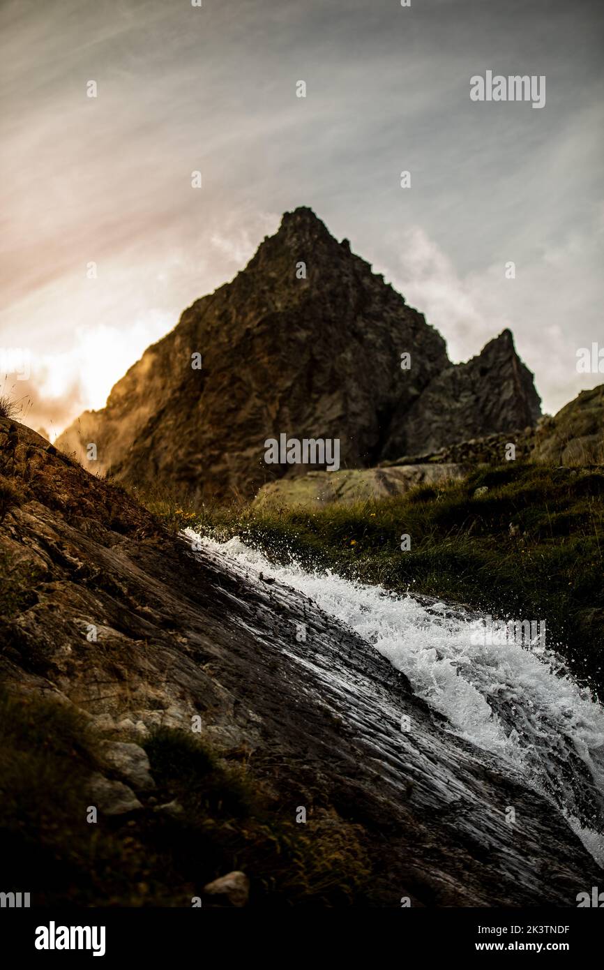 Magnificent landscape of rough rocky Pyrenees mountain peak with rapid ...
