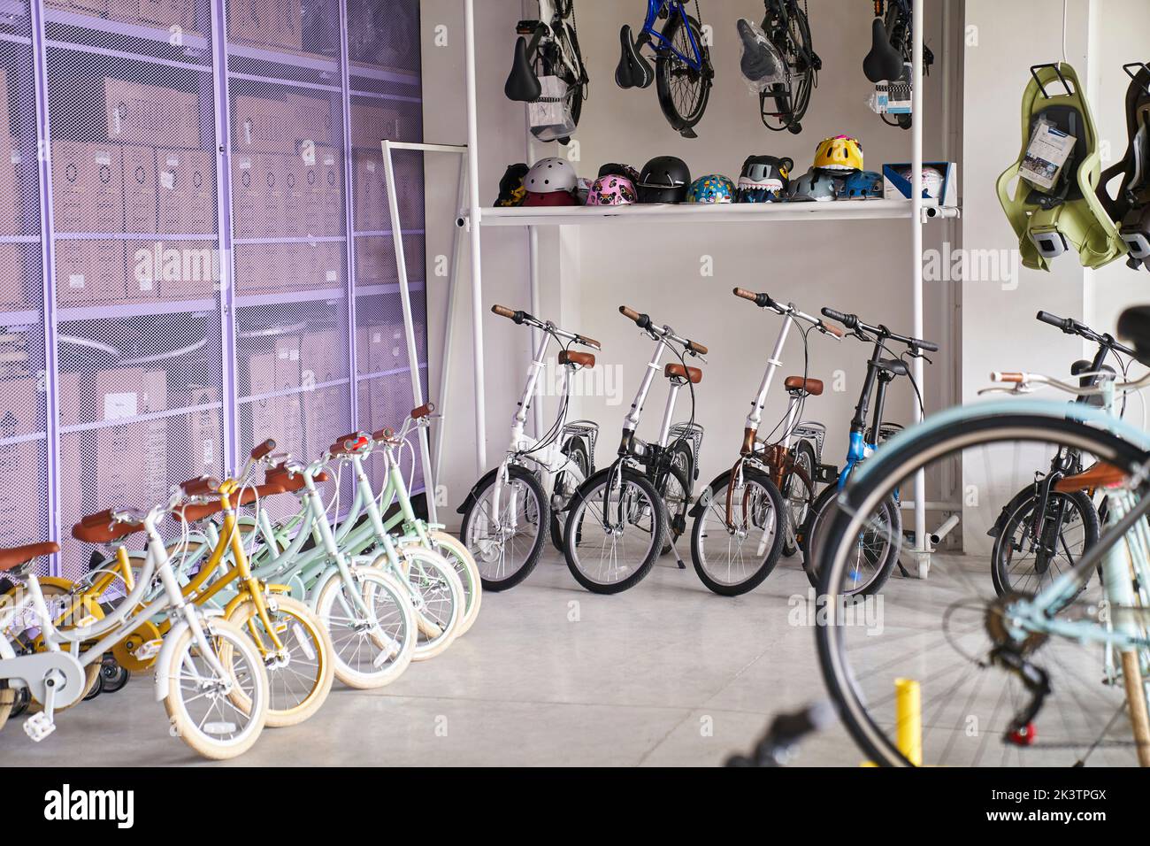 Photo of interior of a bicycle shop with bikes on display Stock Photo ...