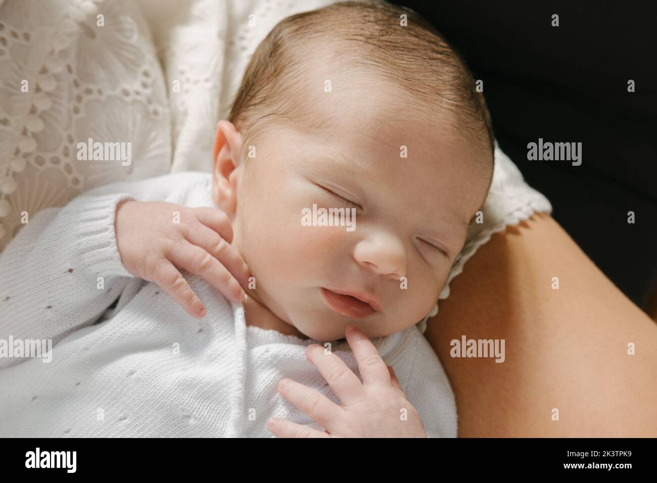 Baby from above arms hi-res stock photography and images - Alamy