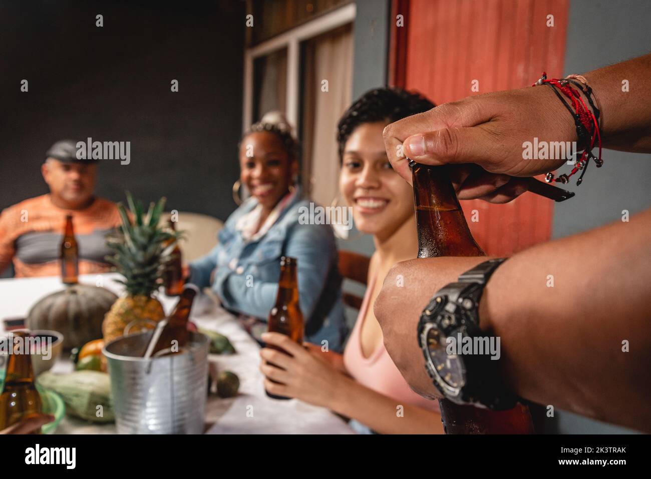 Man opening beer bottle hi-res stock photography and images - Alamy