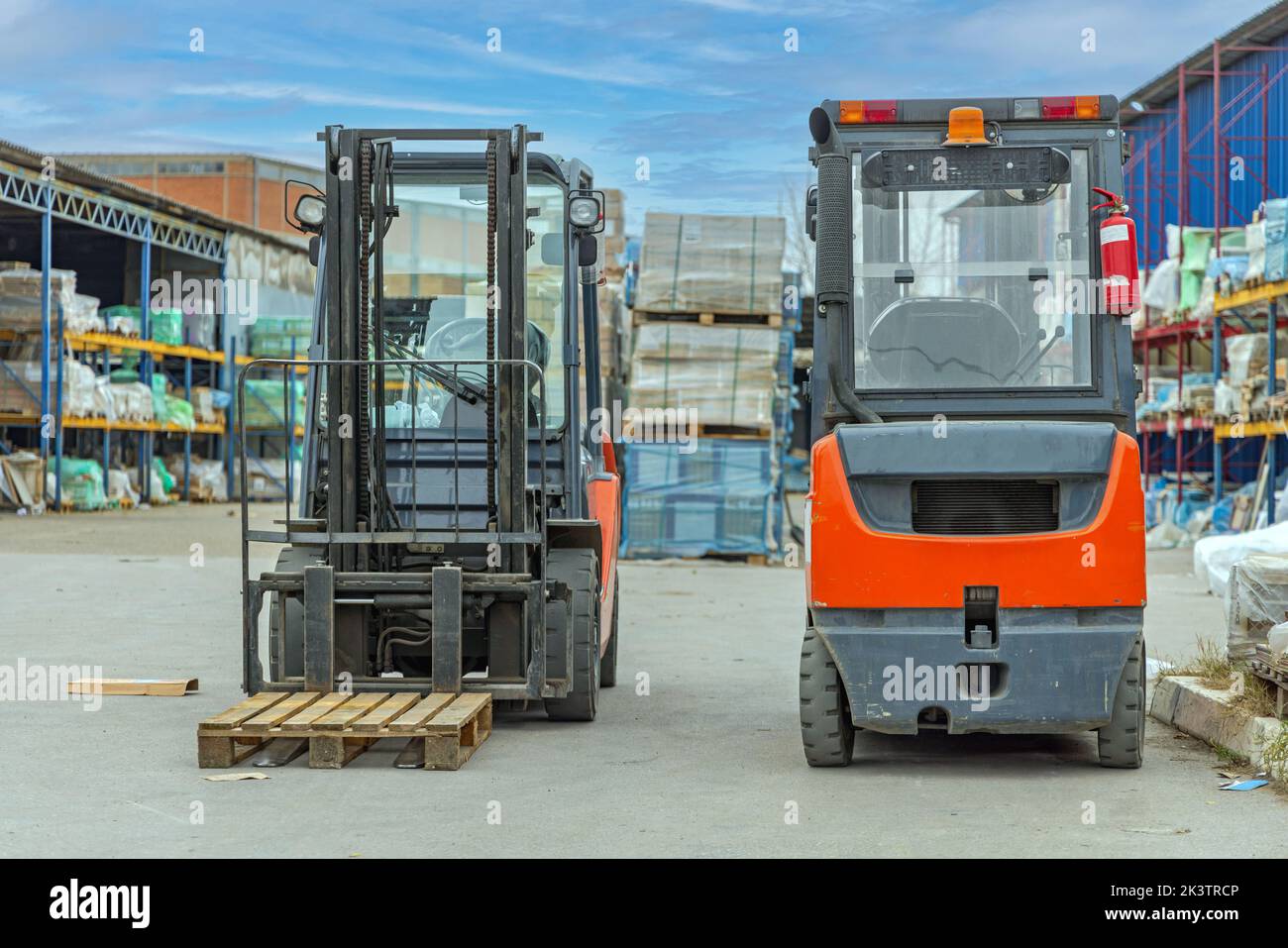 Two Forklift Machines Vehicles at Open Warehouse Storage Stock Photo ...