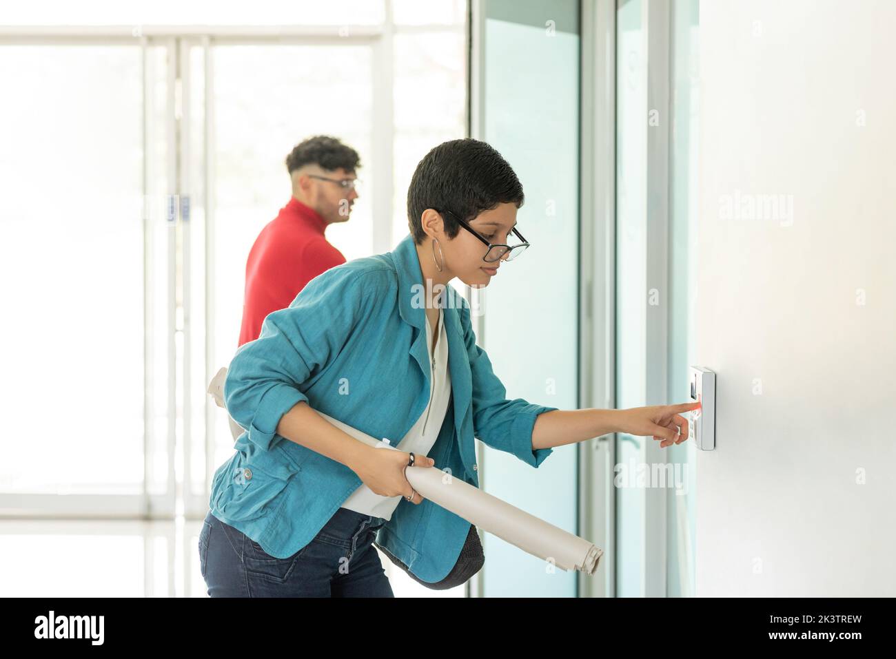 Side view of concentrated Hispanic female with short hair in casual ...