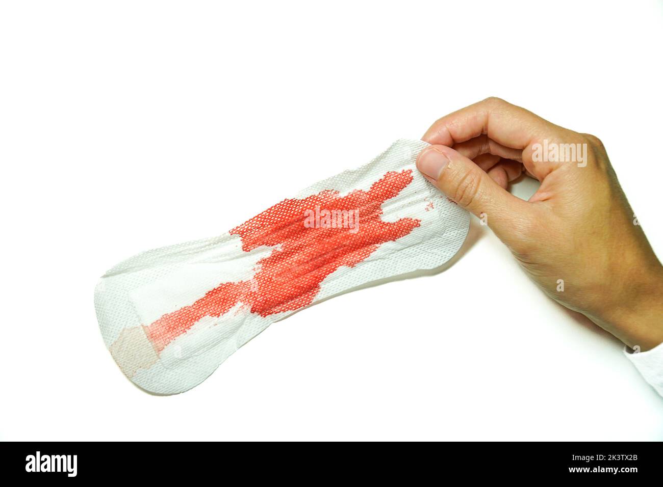 menstruation with blood on a pad with white background Stock Photo - Alamy