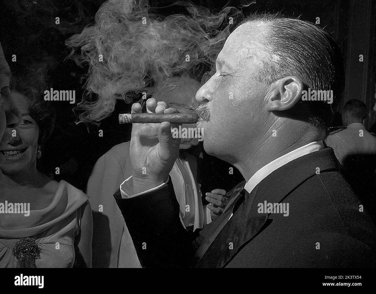 Juan Carlos Ongania, Argentinian, defacto president, smoking a cigar at ...