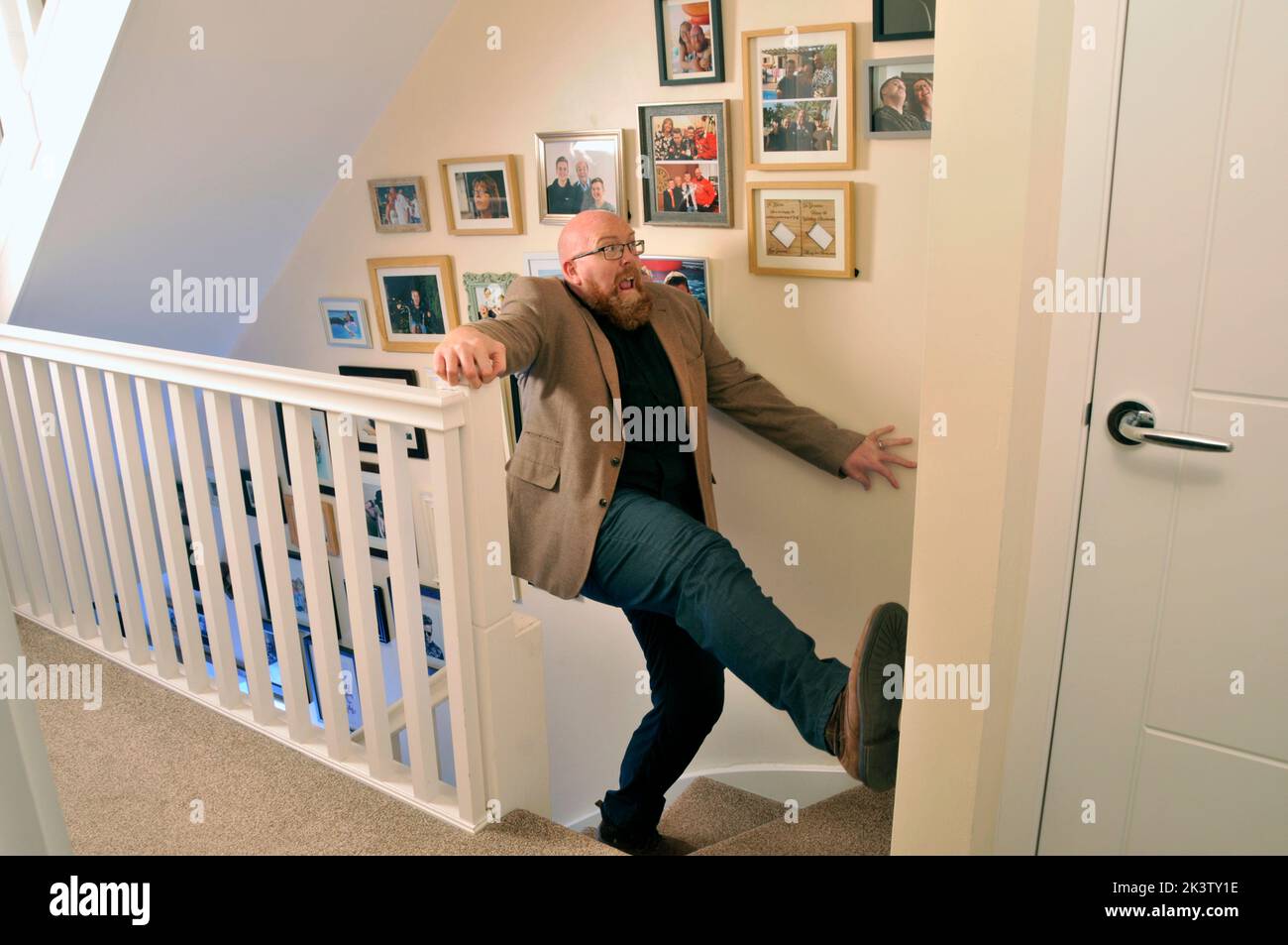 man falling down stairs Stock Photo - Alamy