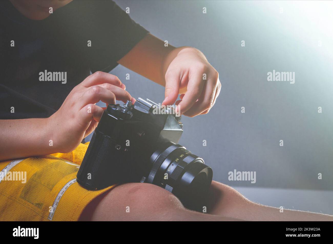 Baby and vintage camera. Beginner photographer. Photography courses ...