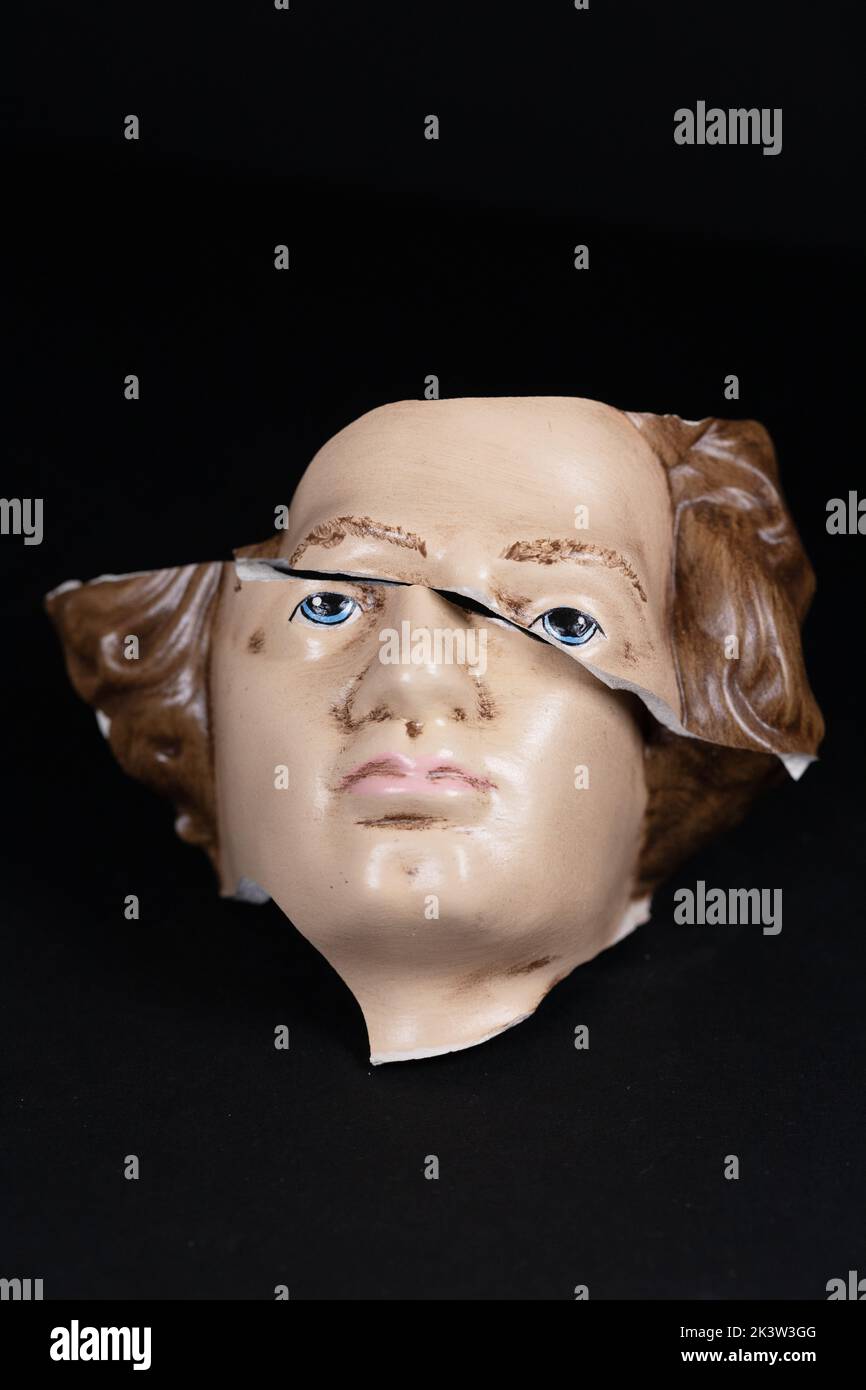 A split and broken face from a ceramic bust of a man Stock Photo - Alamy