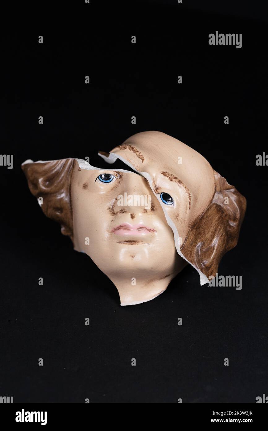 A split and broken face from a ceramic bust of a man Stock Photo - Alamy