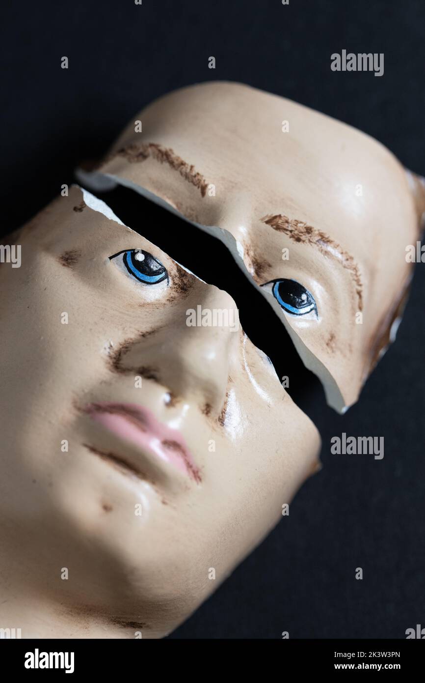 A split and broken face from a ceramic bust of a man Stock Photo - Alamy
