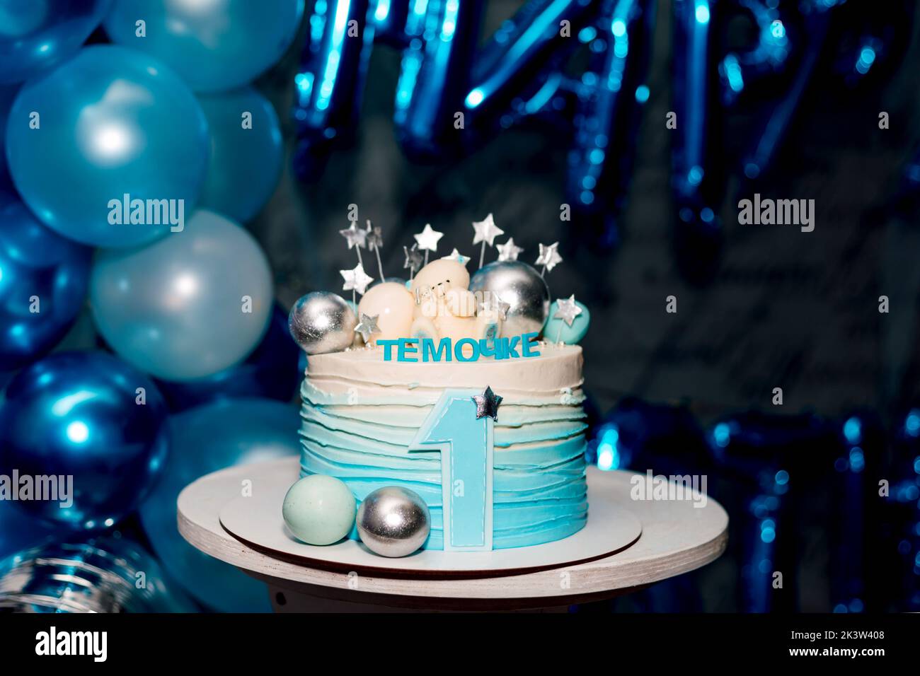 Beautiful big blue cake for the first birthday with balls Stock Photo ...