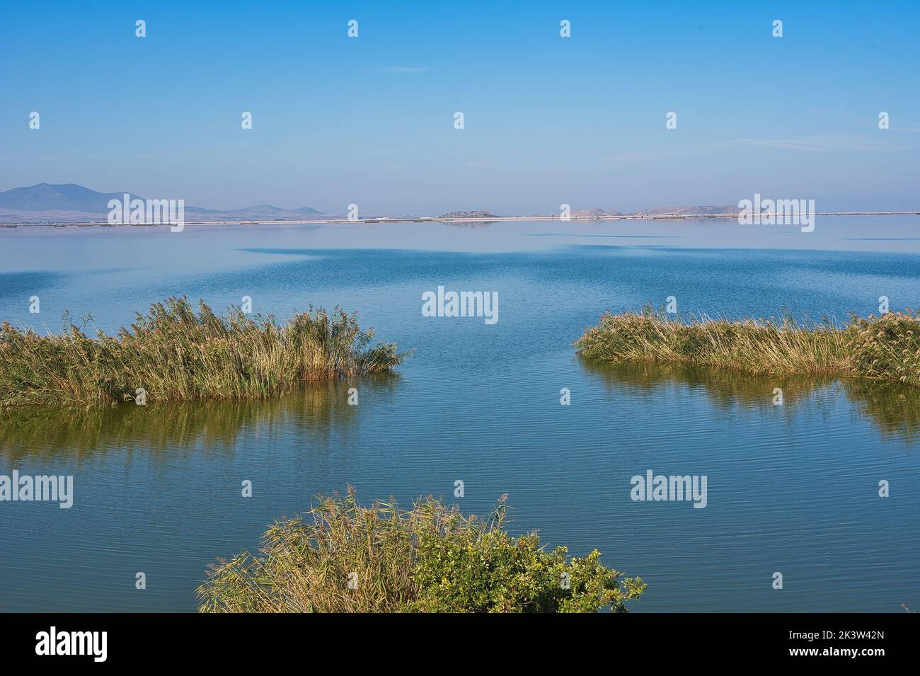Lake Karla, Greece ,beautiful calm lake with mirages Stock Photo - Alamy