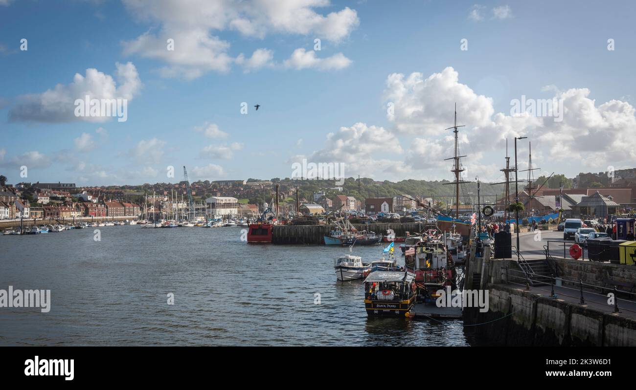 The port and seaside town of Whitby in North Yorkshire, UK Stock Photo ...