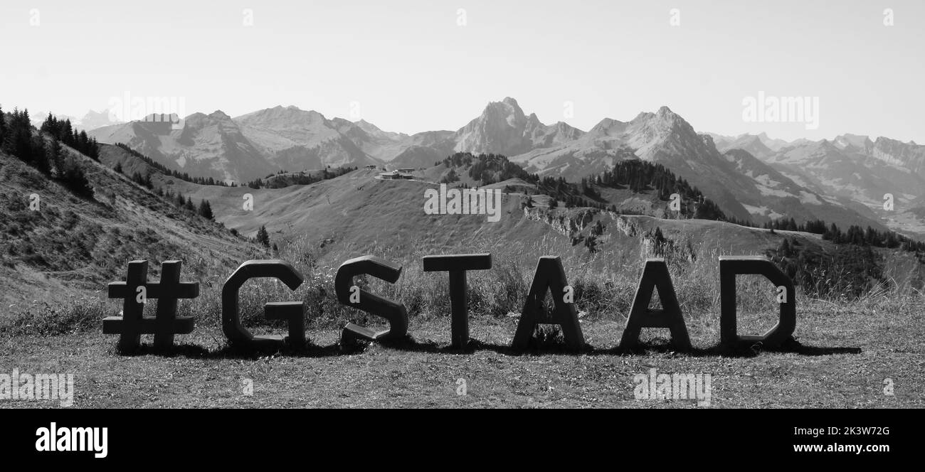 Mountain range and Gstaad letters on Mount Rinderberg Stock Photo - Alamy