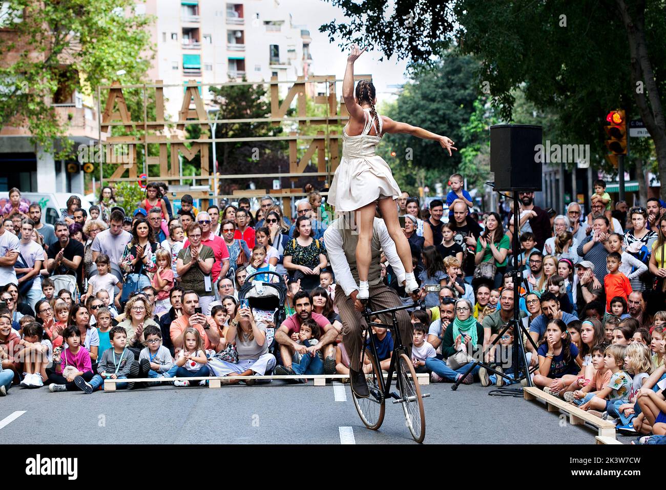 Bicycle acrobatic act, La Mercè, Barcelona, Spain Stock Photo - Alamy