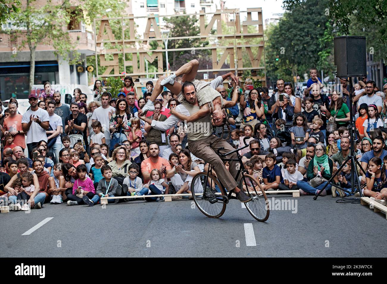 Bicycle acrobatic act, La Mercè, Barcelona, Spain Stock Photo - Alamy