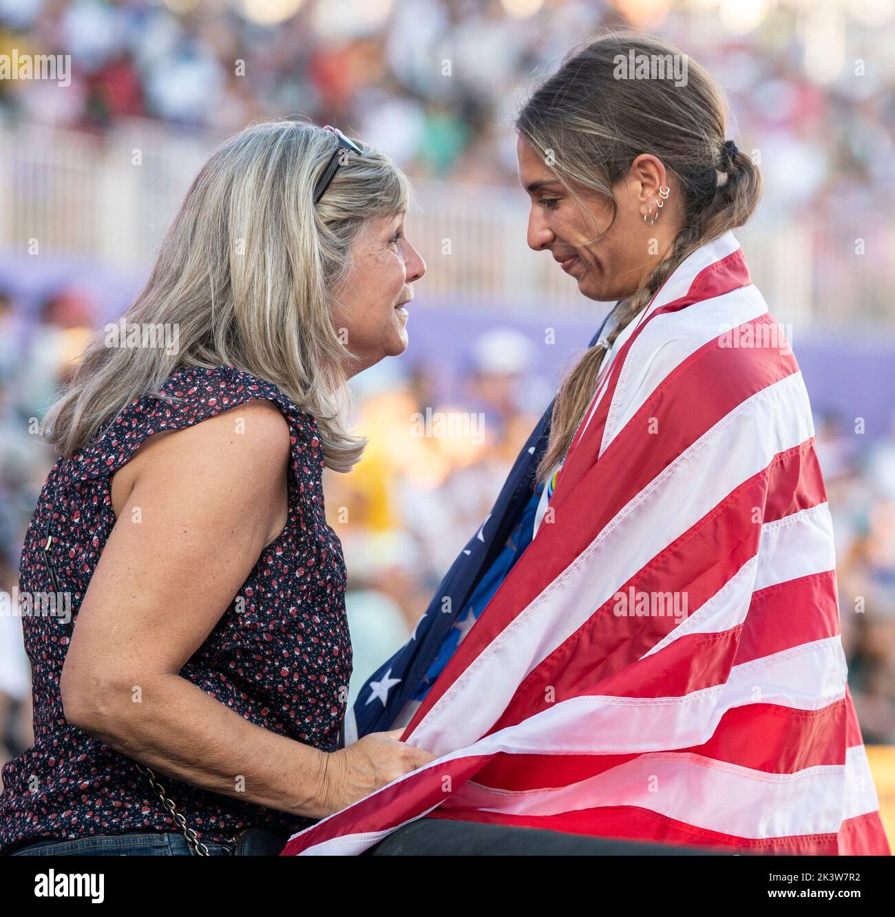Valarie Allman of the USA getting a hug from mum Lisa for winning the ...
