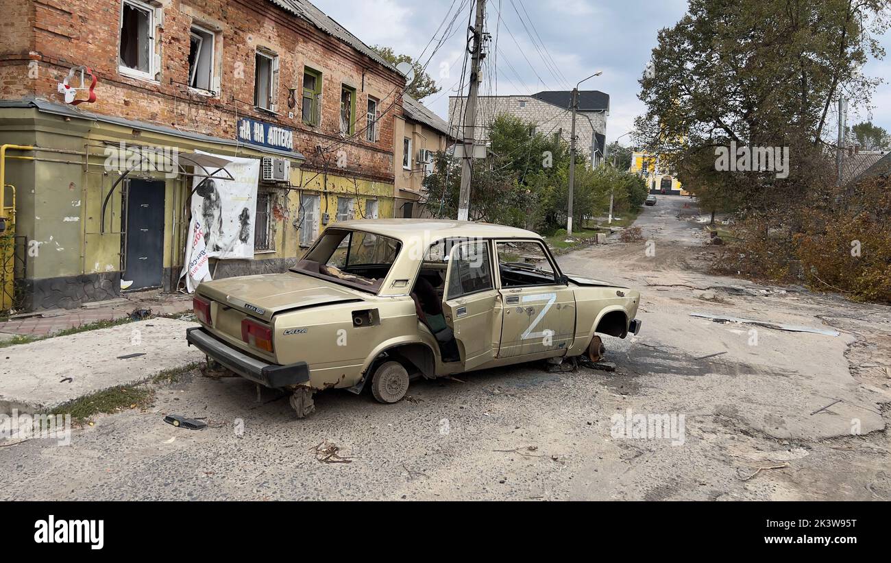 Destroyed car with markings of occupation troops in Kupiansk, Ukraine ...
