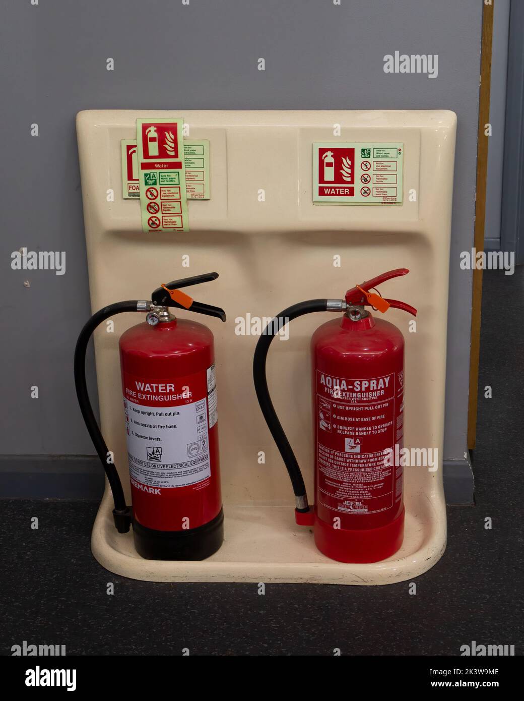 Two fire extinguishers hi-res stock photography and images - Alamy