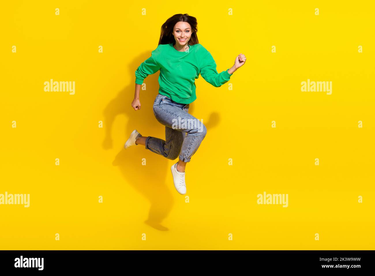 Full size photo of cute young unstoppable woman smile running marathon ...