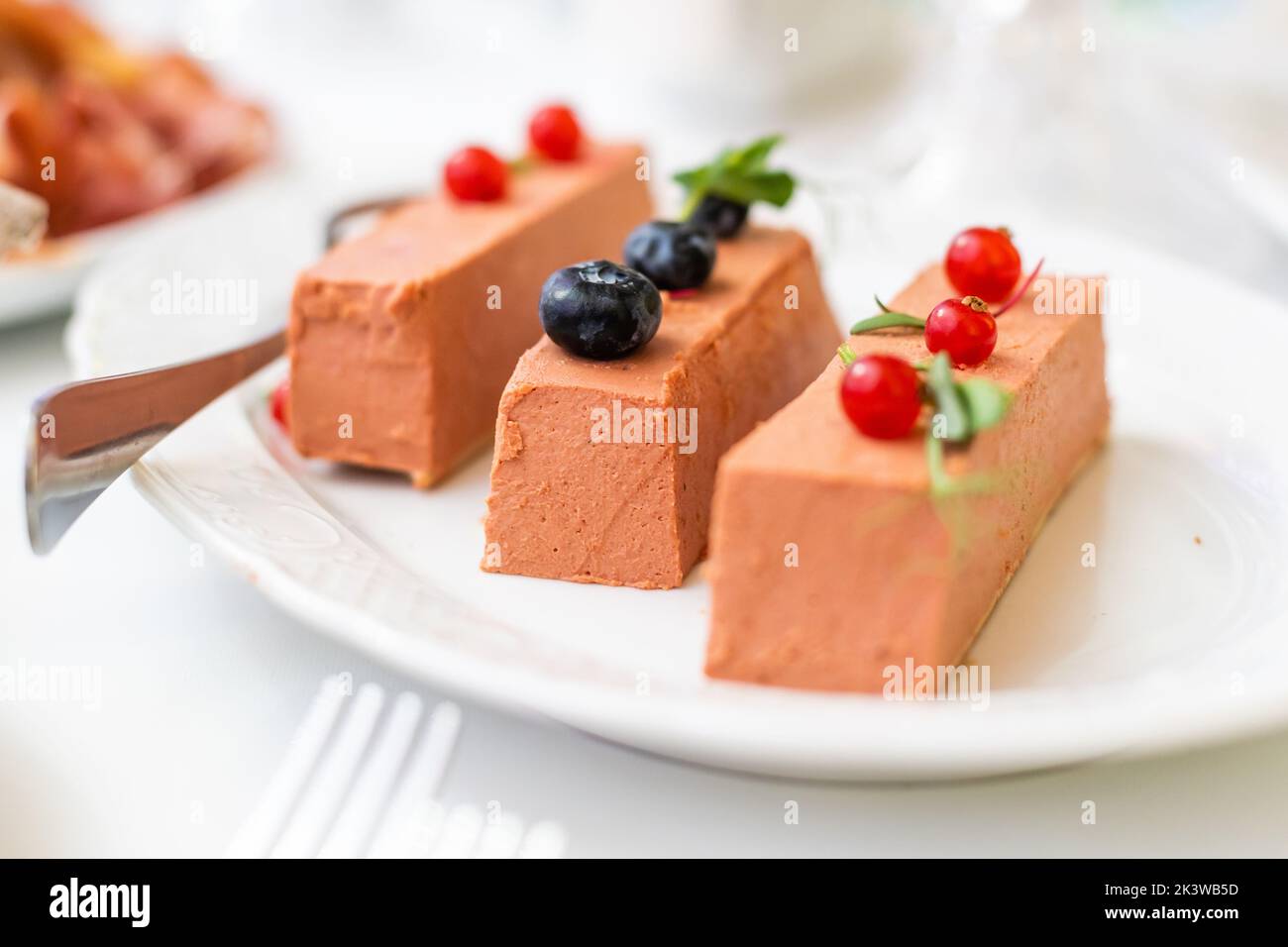 Banquet buffet food. Pomegranate salad with stuffed profiteroles and ...