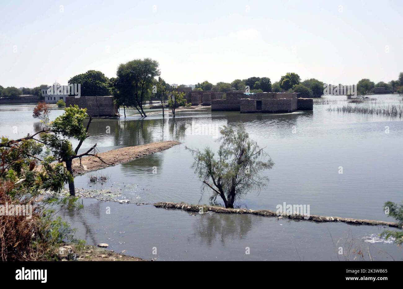 View of stagnant floodwater after flash flood caused by heavy downpour ...