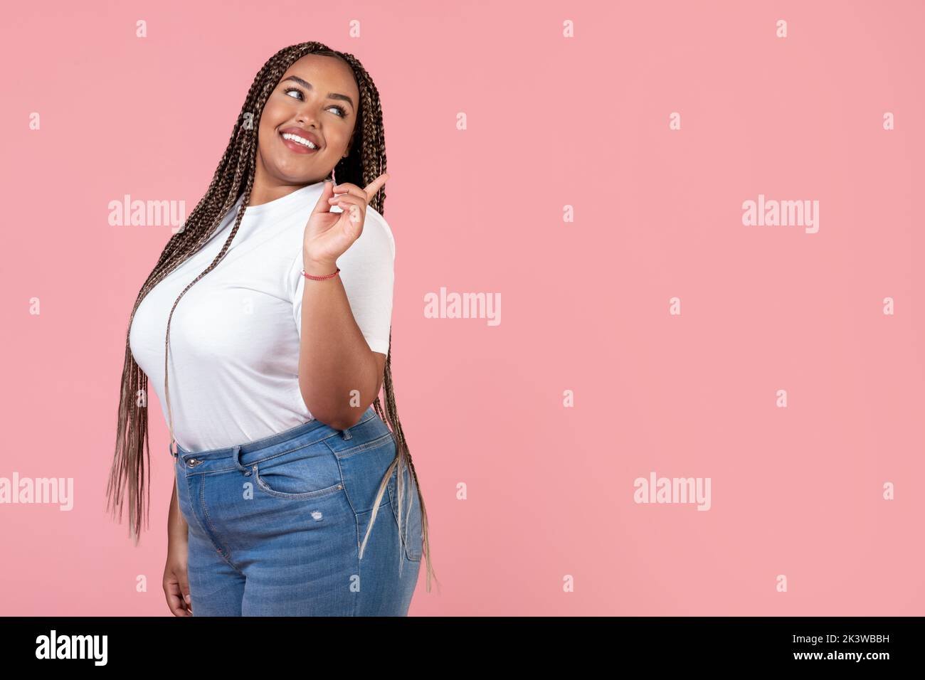 Pretty African American Obese Woman Pointing Finger Aside, Pink ...
